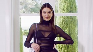 Kendall Jenner shows off slim figure & long legs in sheer body suit